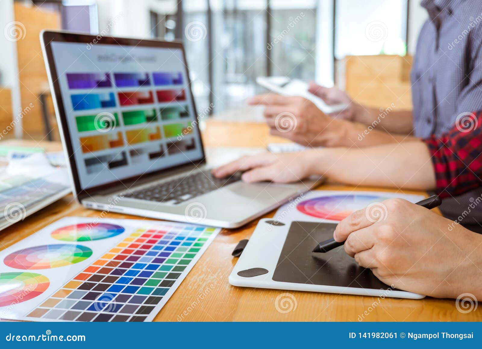 Teamwork of Young Creative Designers Working on Project Together and ...