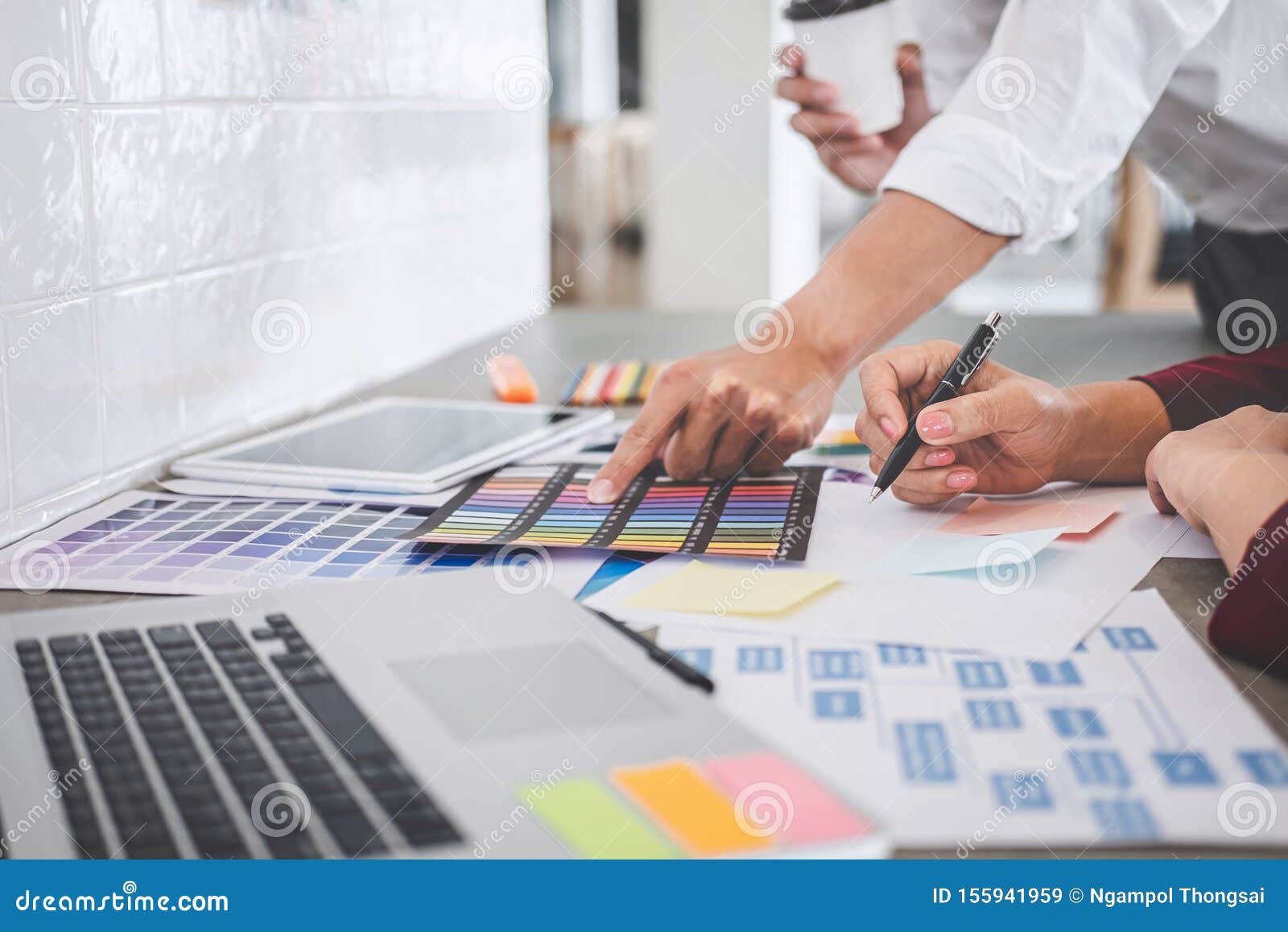 Teamwork of Young Creative Designers Working on Project Together and ...