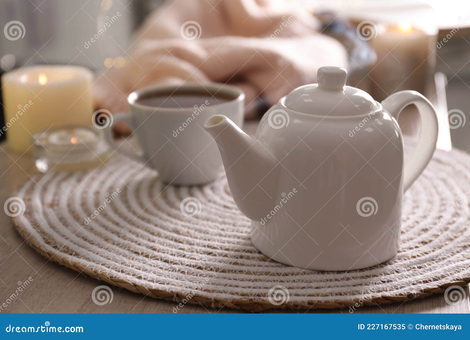 Teapot with Cup of Hot Tea on Table Indoors Stock Image - Image of ...
