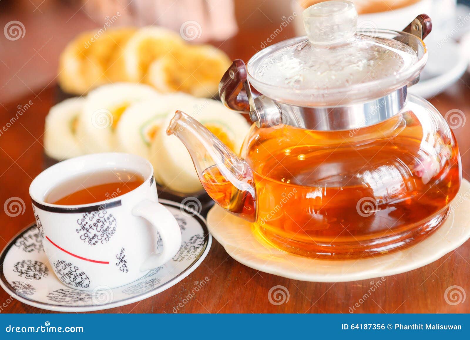 Teapot and Cup of Tea on Wooden Table Stock Photo - Image of green ...