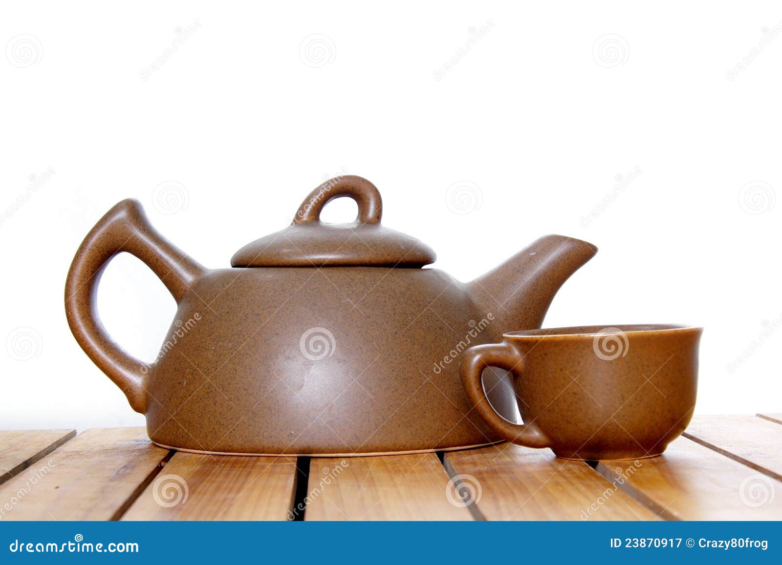 Teapot and Cup on Wooden Table Stock Image - Image of dish, orange ...
