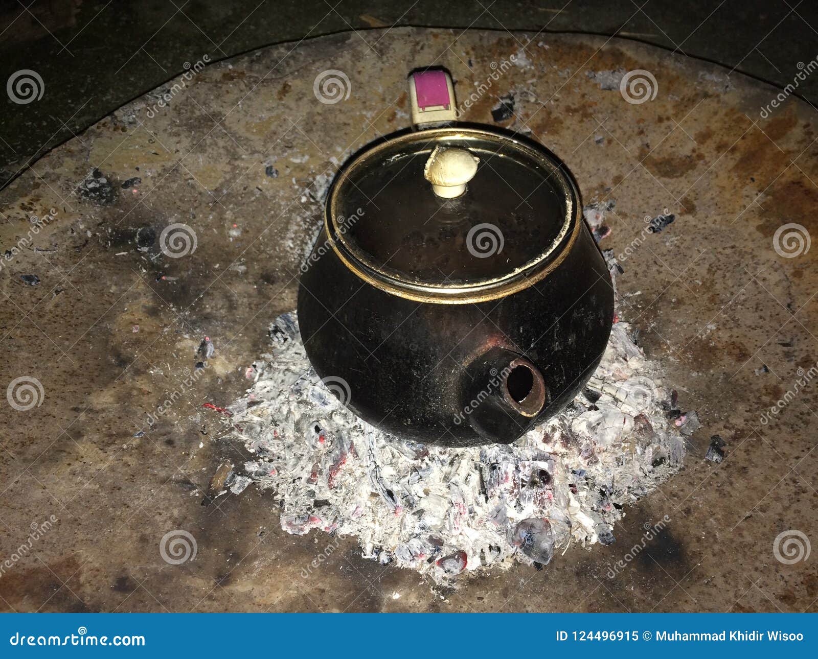Teapot on fire stock image. Image of drop, boil, coals - 124496915