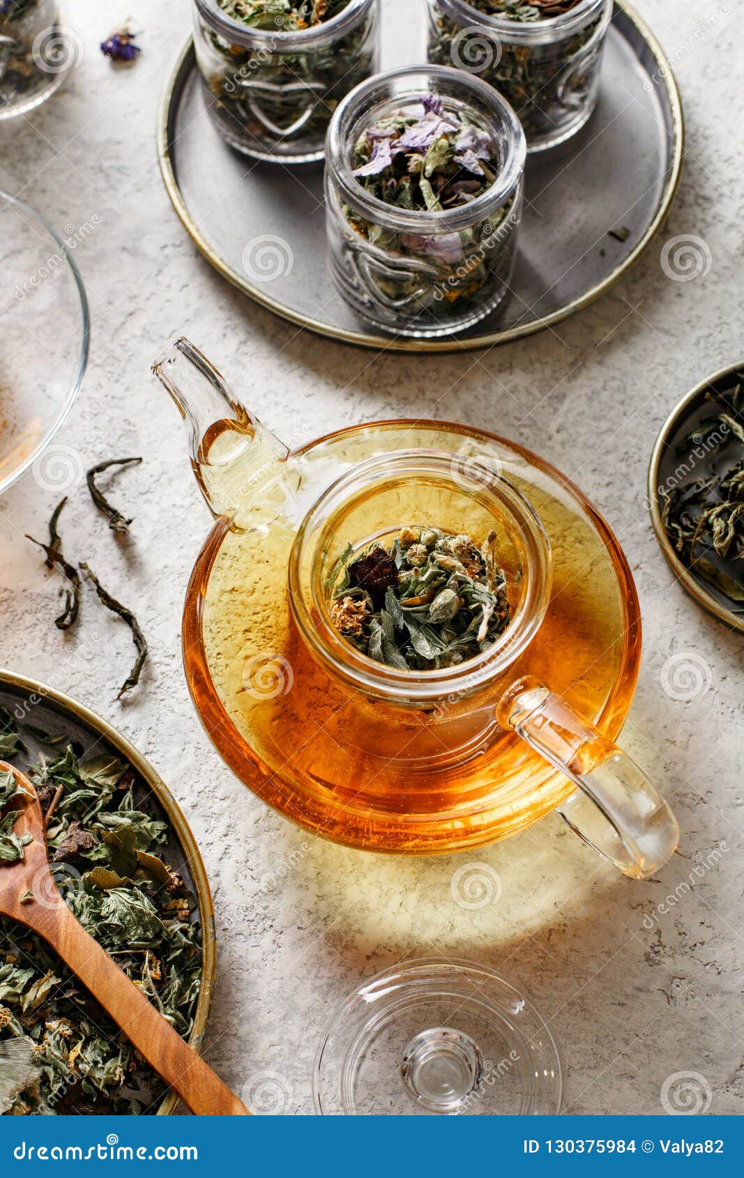 Teapot with fresh tea stock photo. Image of floral, green - 130375984