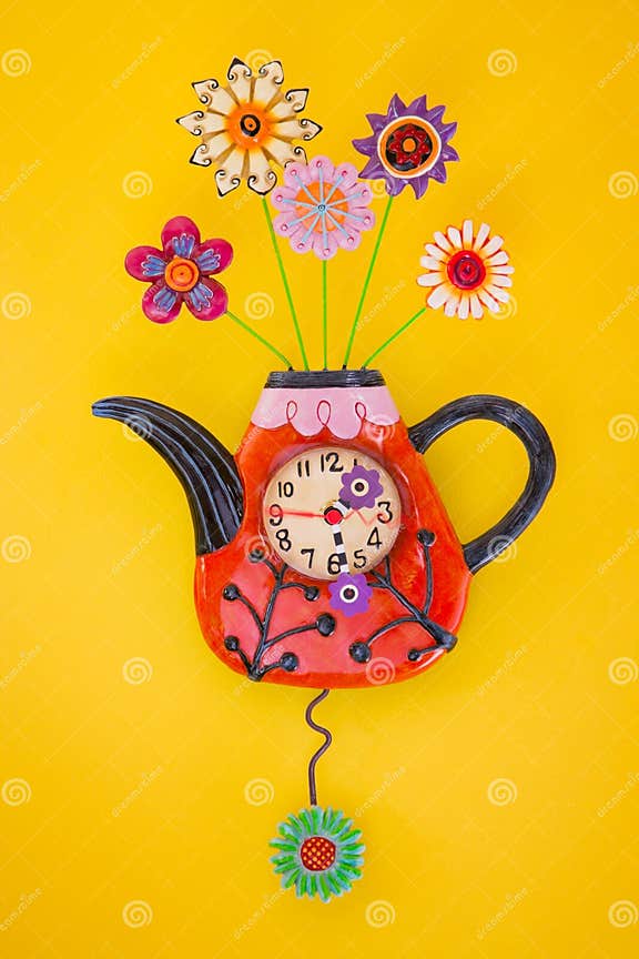 Teapot Shape Clock on Yellow Wall Stock Image - Image of multicoloured ...