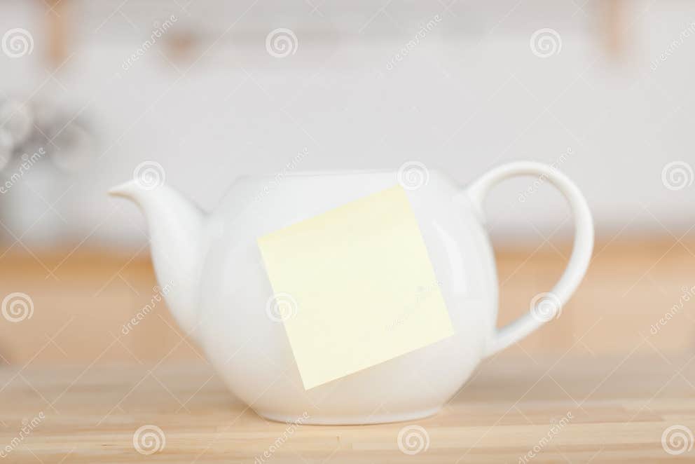 Teapot with Tag Stuck on it Stock Photo - Image of paper, detail: 31881512