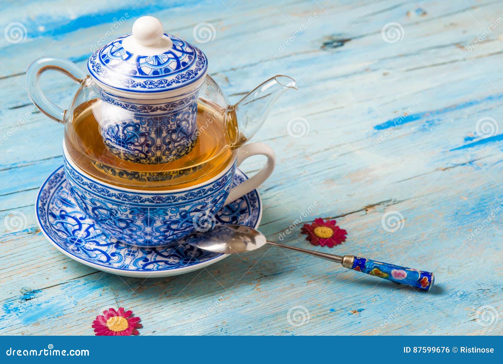 Teapot, teacup and spoon stock photo. Image of drink - 87599676