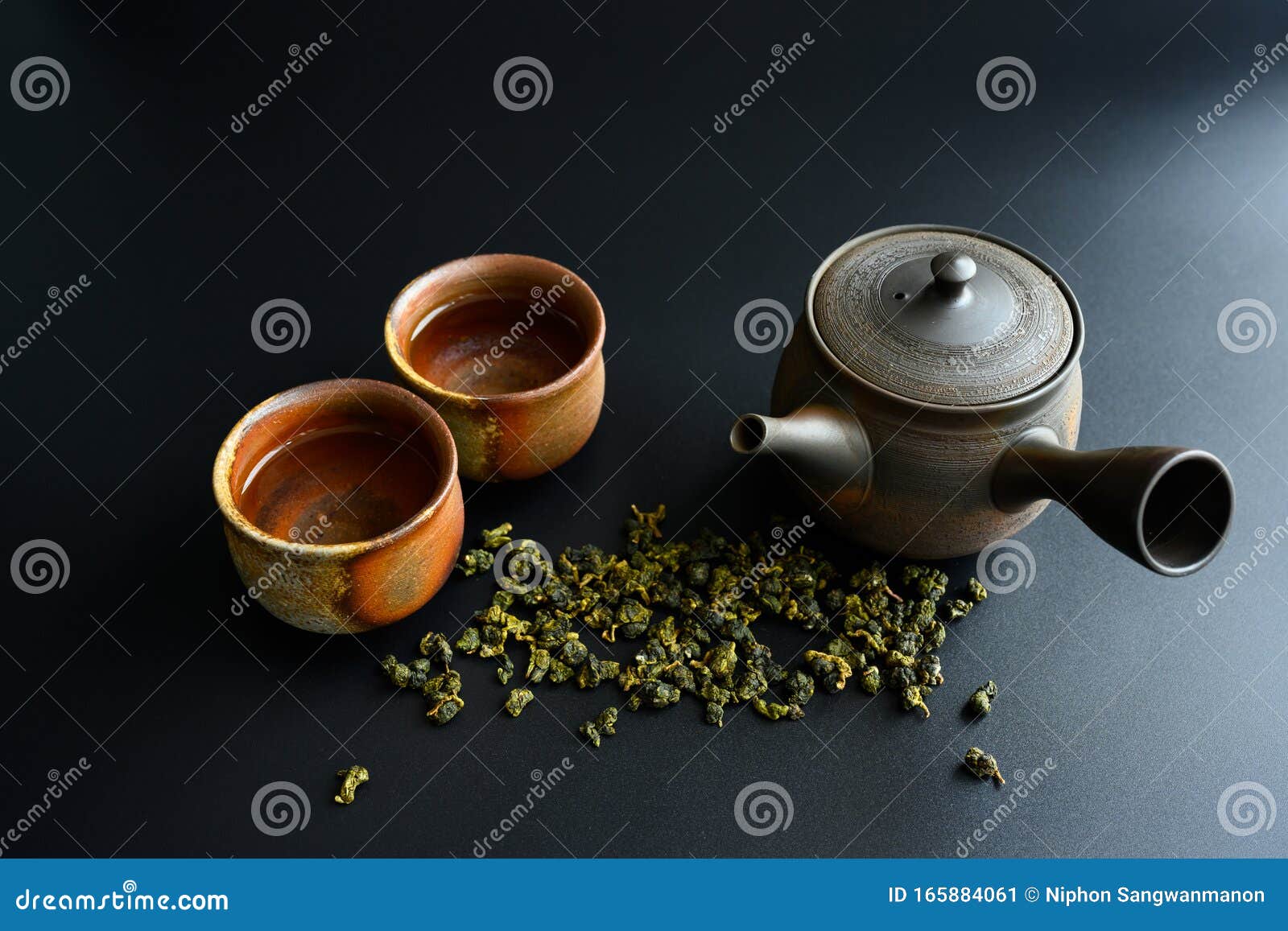Japanese Style Tea Cups and Two Teapots Made of Clay Stock Image ...