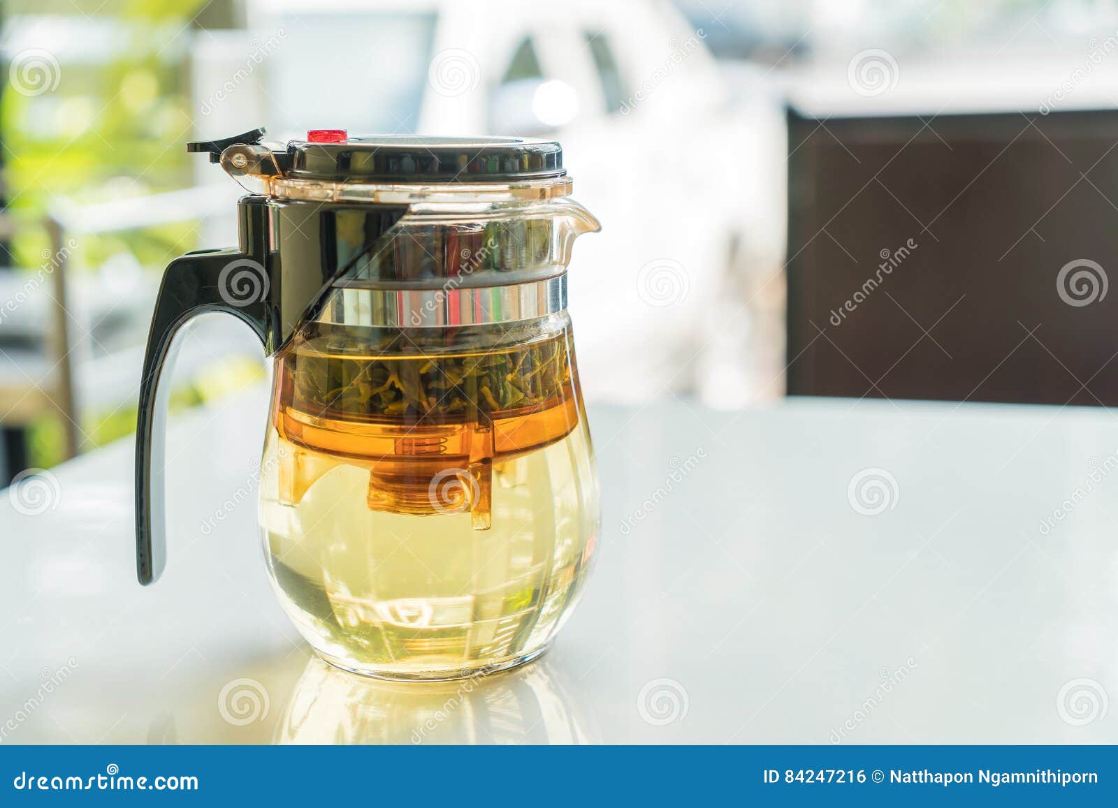 Teapots on white table stock photo. Image of closeup - 84247216