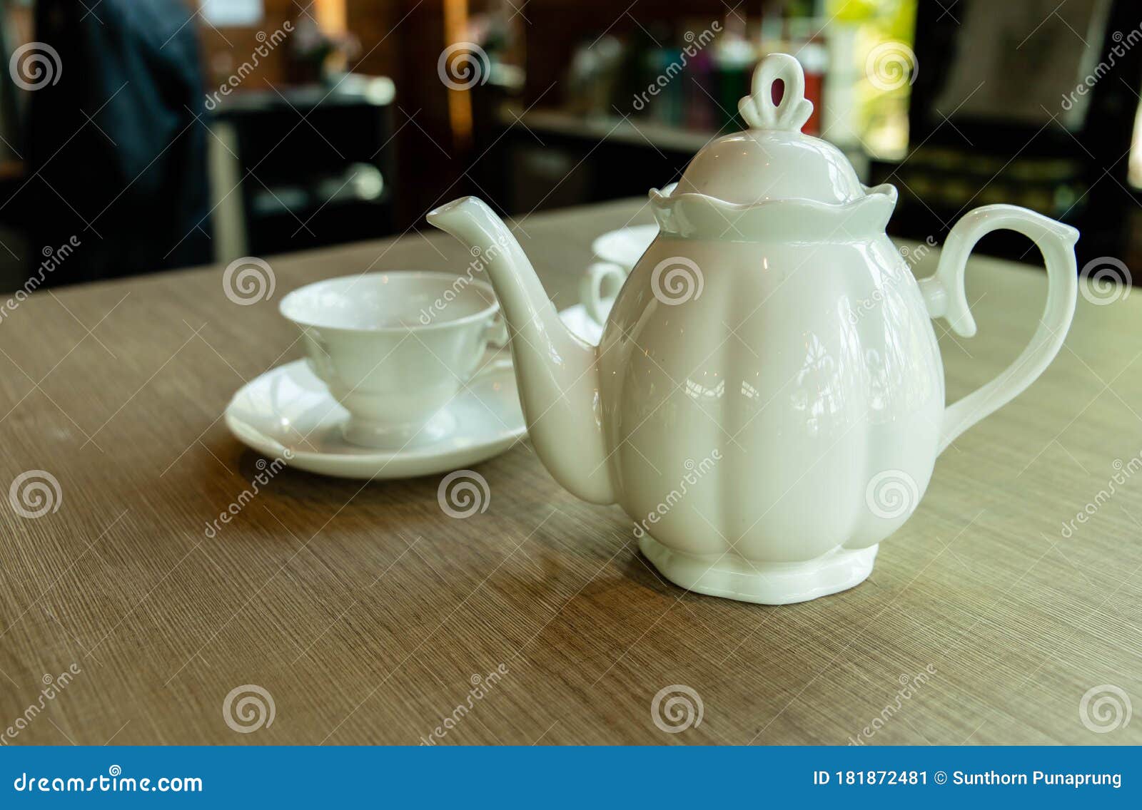 Tea Pot on a Wooden Table in a Coffee Shop Stock Image - Image of ...