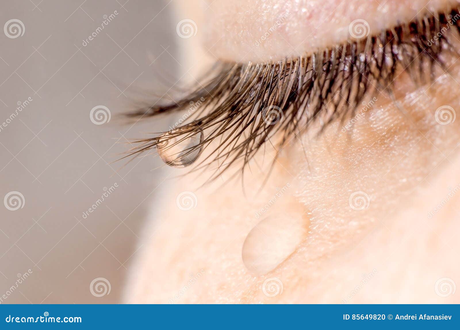 A Tear on Eyelashes and Cheek Stock Photo - Image of monochrome, bright ...