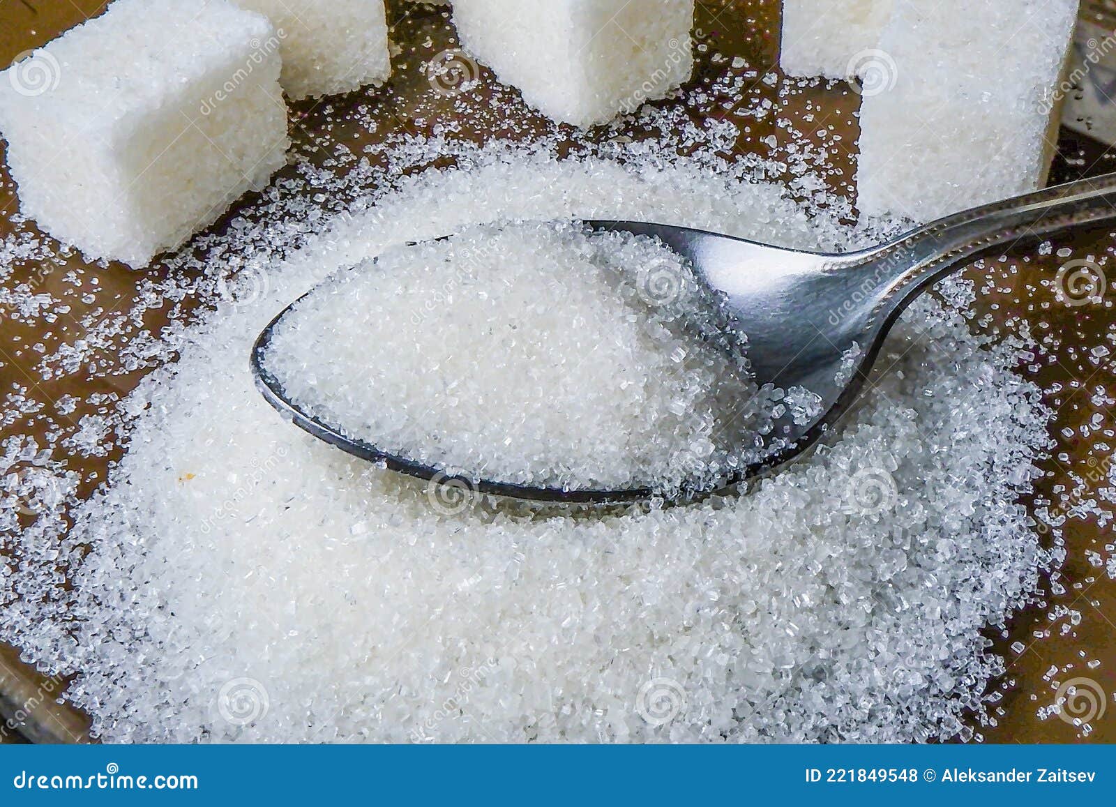 A Teaspoon of Sugar Lies on a Mound of Sugar Stock Photo - Image of ...