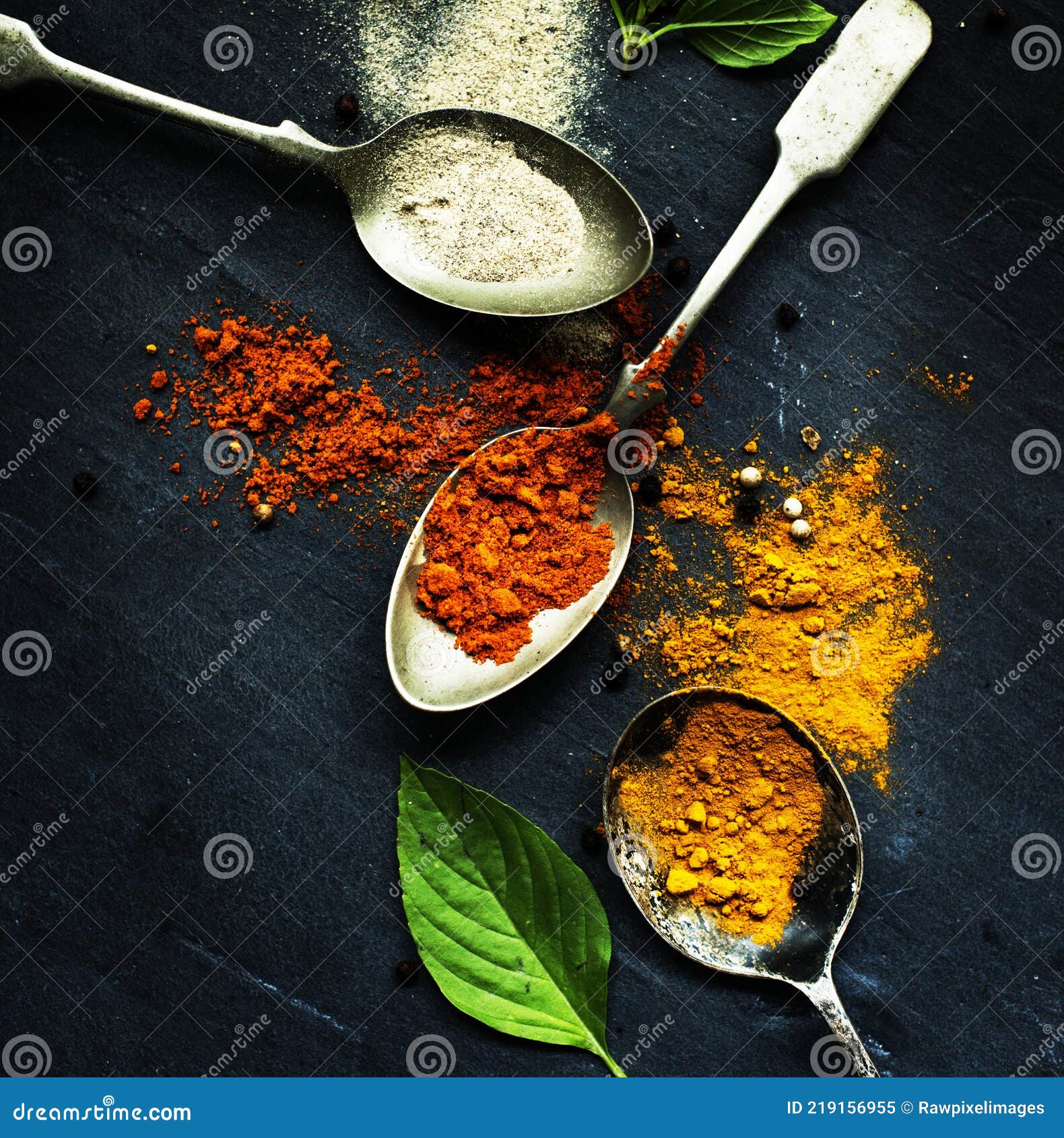 Teaspoons of Herbs and Turmeric Powder Stock Image - Image of powder ...