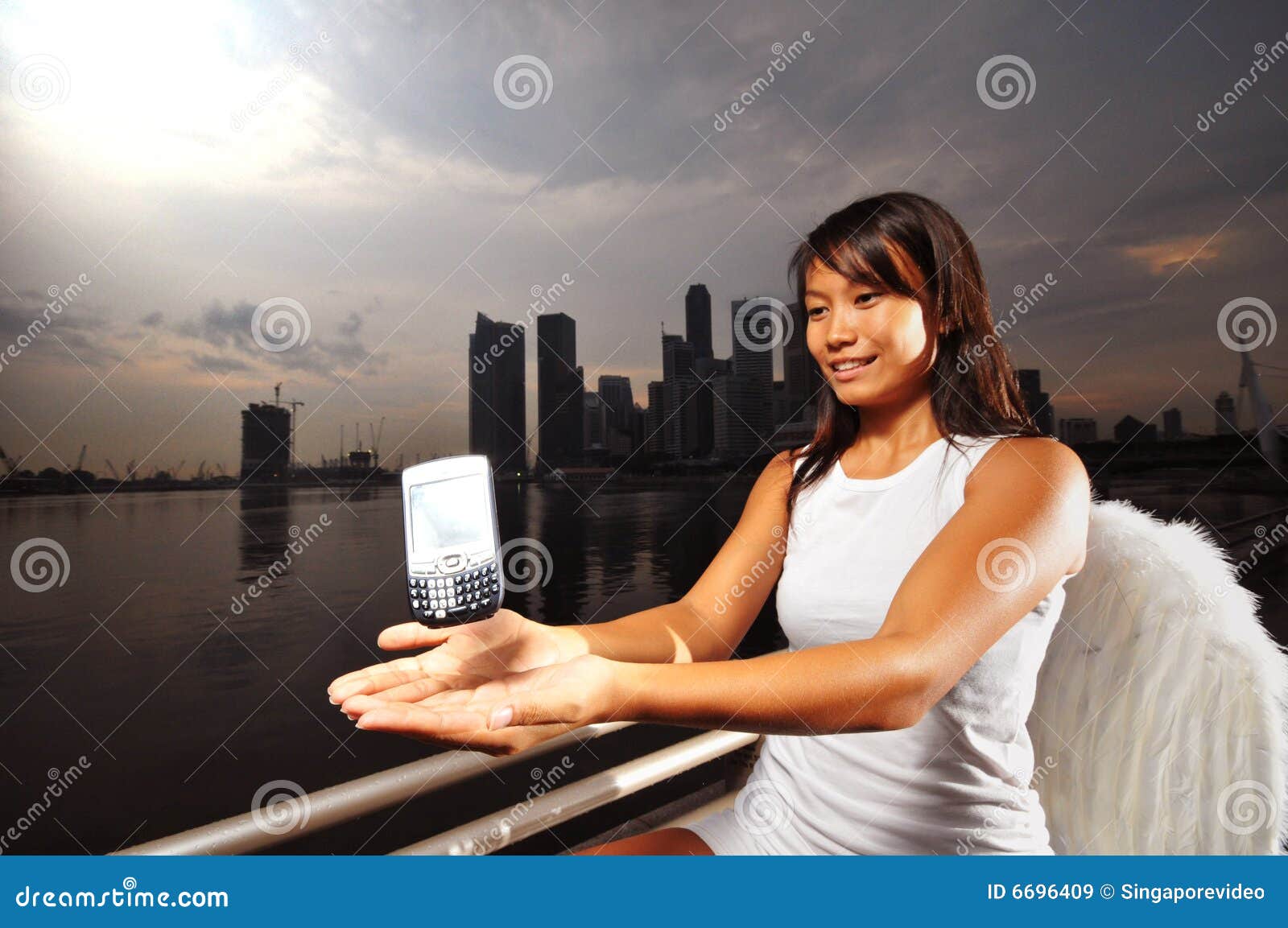 Tech Angel in the city - 2 stock image. Image of assistant - 6696409