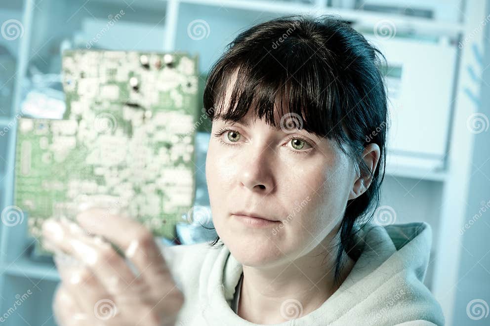 Tech Examines a Curcuit Board Stock Photo - Image of array, bleach ...