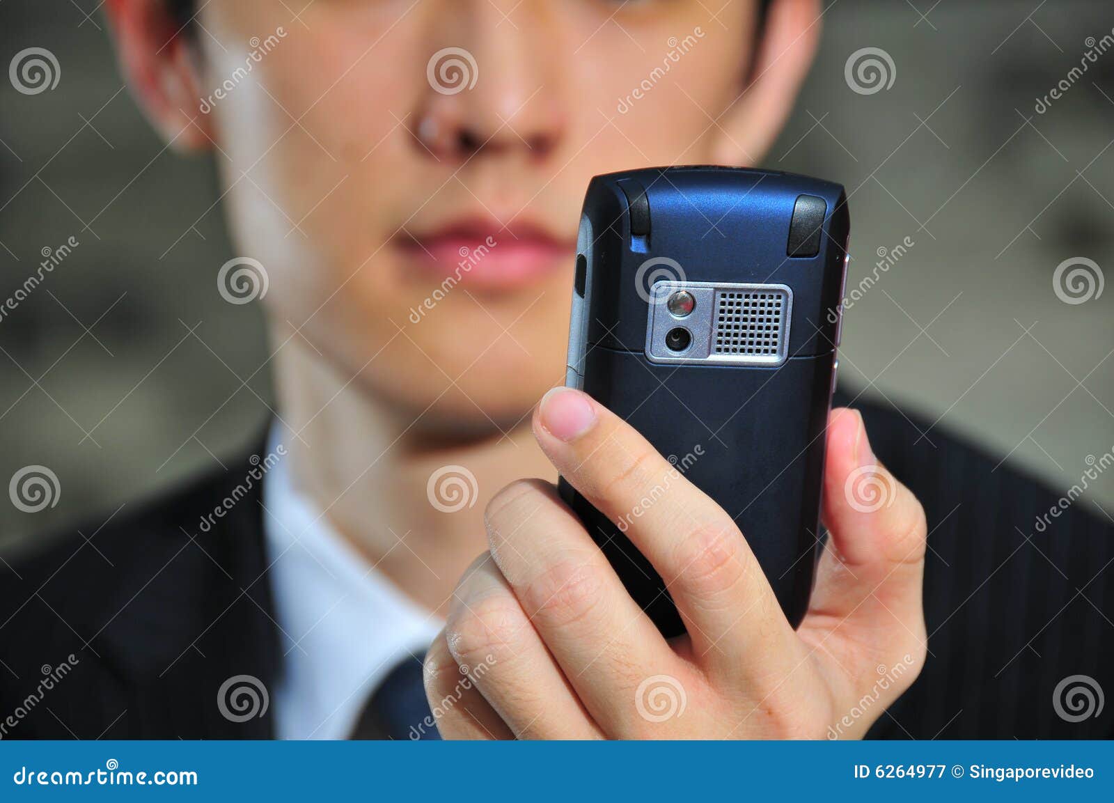 Tech Savvy Asian Executive Reading from His Mobile Stock Image - Image ...