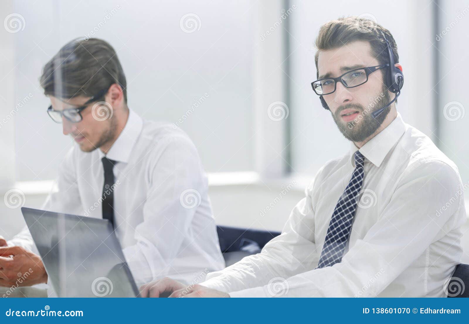 Tech Support Manager in Headset Consulting a Client Stock Photo - Image ...
