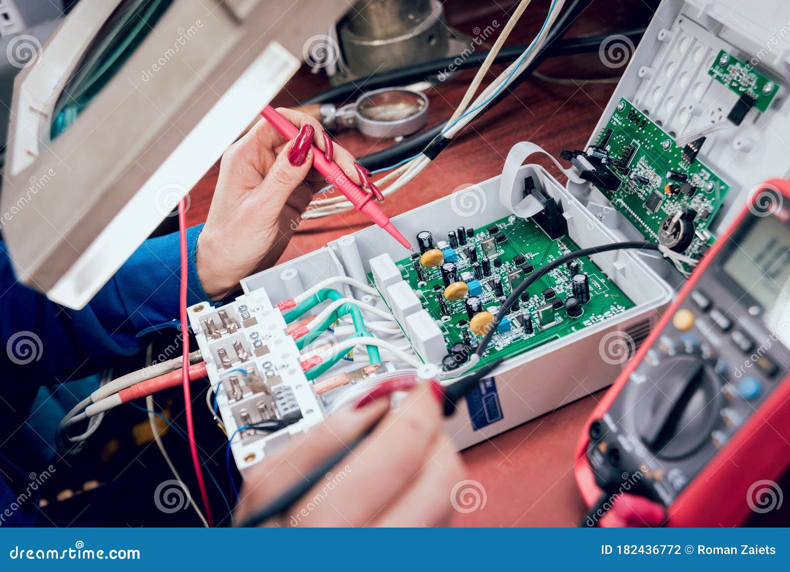 Tech Tests Electronic Equipment in Service Centre Stock Photo - Image ...