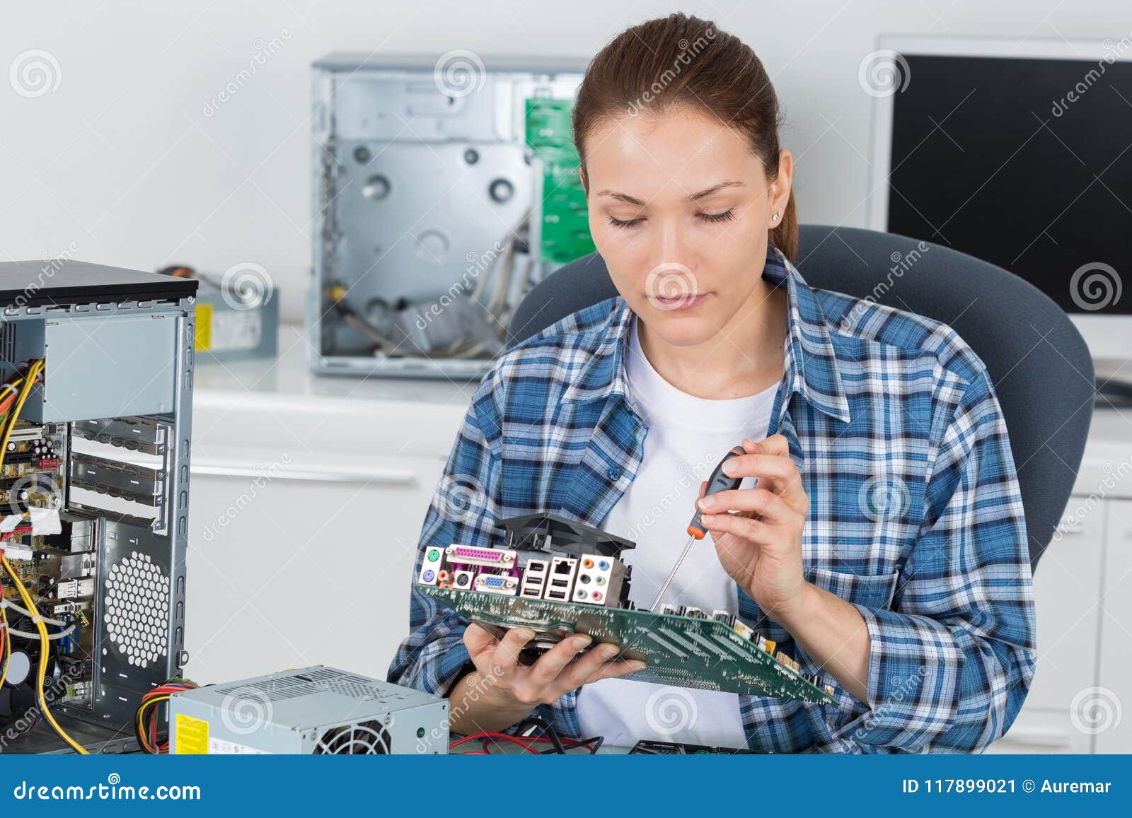 Tech Tests Electronic Equipment in Service Centre Stock Image - Image ...