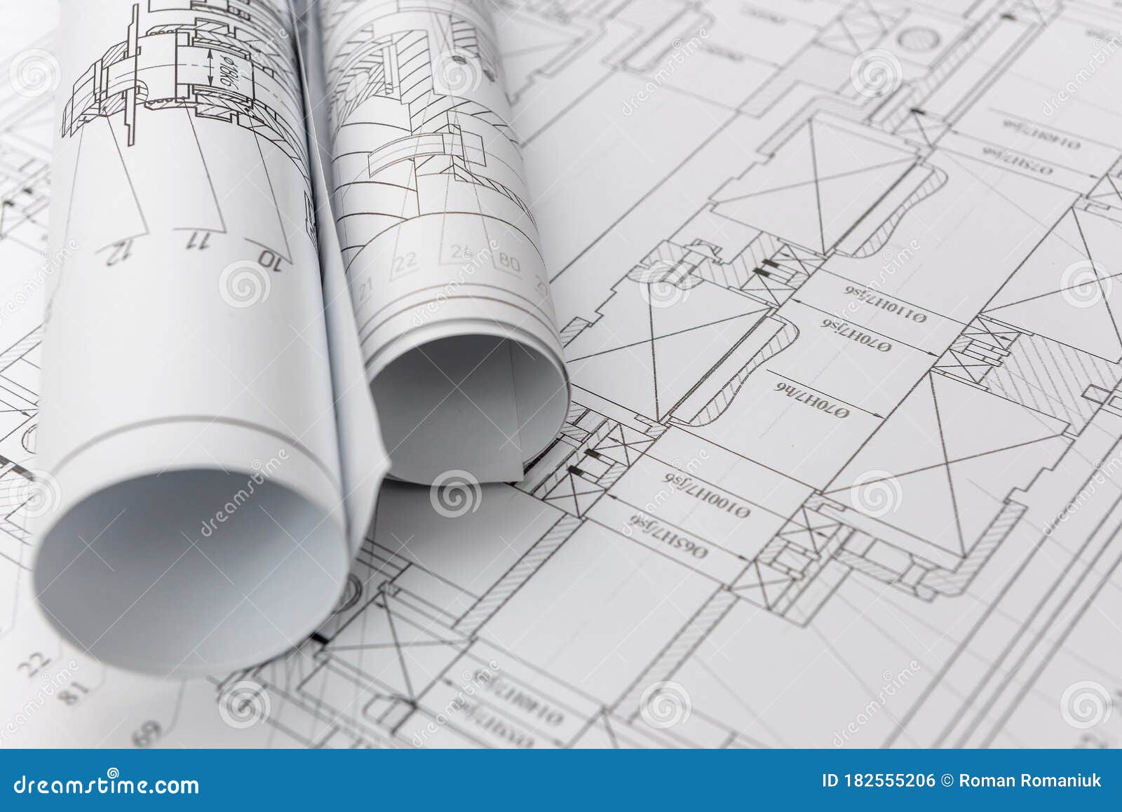 Technical Drawings with Blueprints in Rolls Close Up. Engineering ...