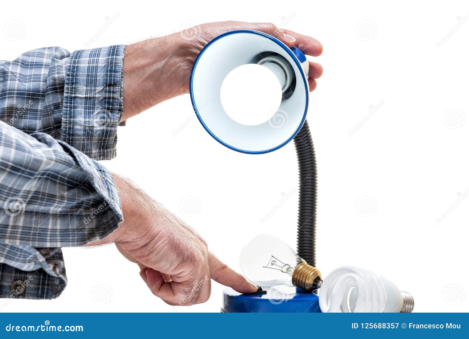 Electrician Technician at Work Installs the New Energy-saving LED Bulb ...