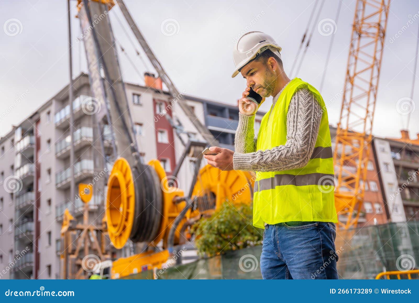 Technical Engineer at the City Site while Having a Phone Call Stock ...