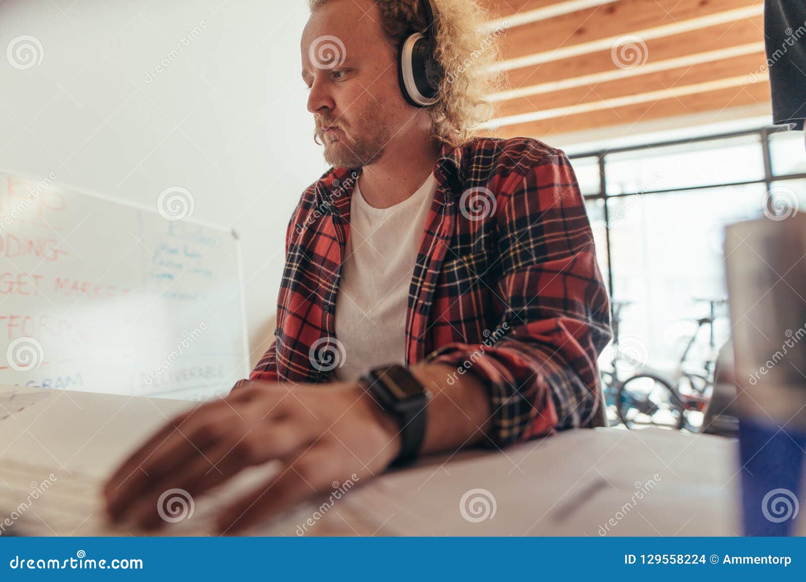 Technical Support Guy Working in a Small Office Stock Photo - Image of ...
