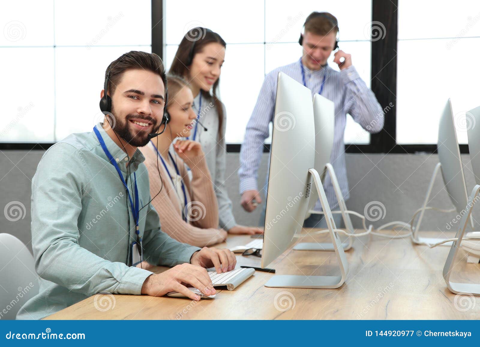 Technical Support Operator Working with Colleagues Stock Image - Image ...
