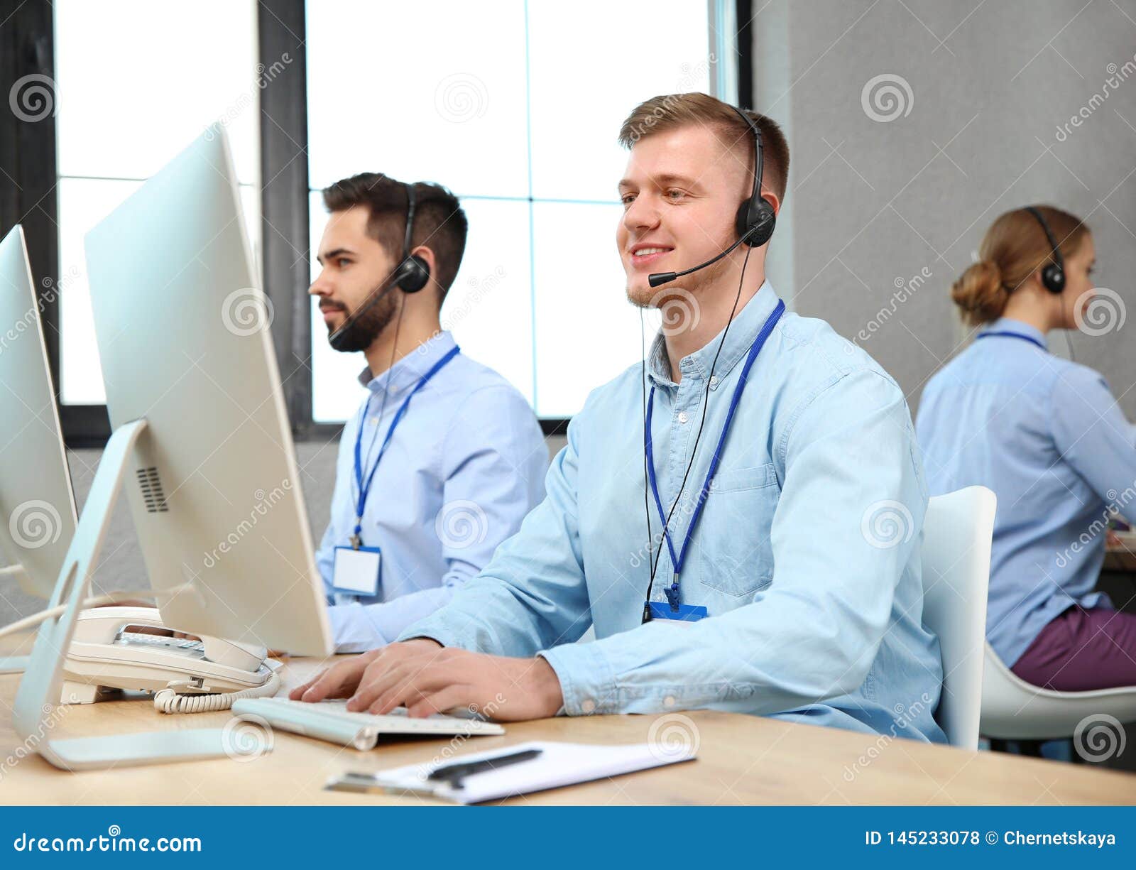 Technical Support Operator Working with Colleagues Stock Photo - Image ...