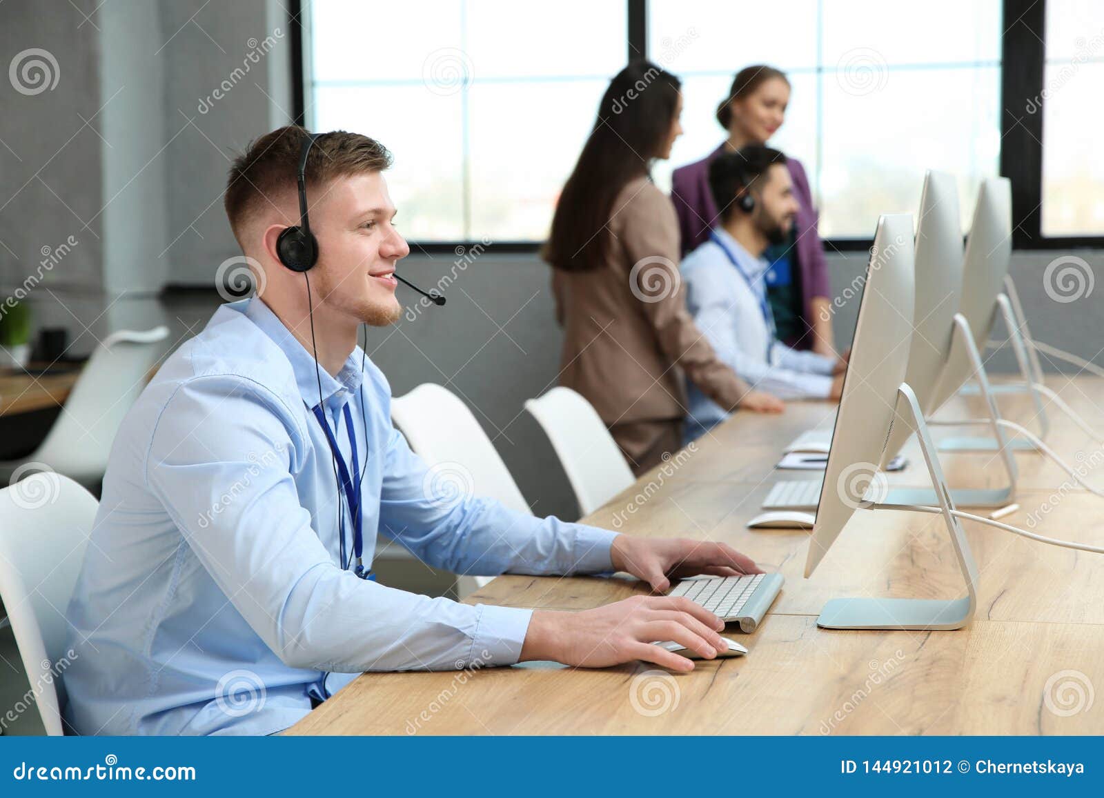 Technical Support Operator Working with Colleagues Stock Photo - Image ...