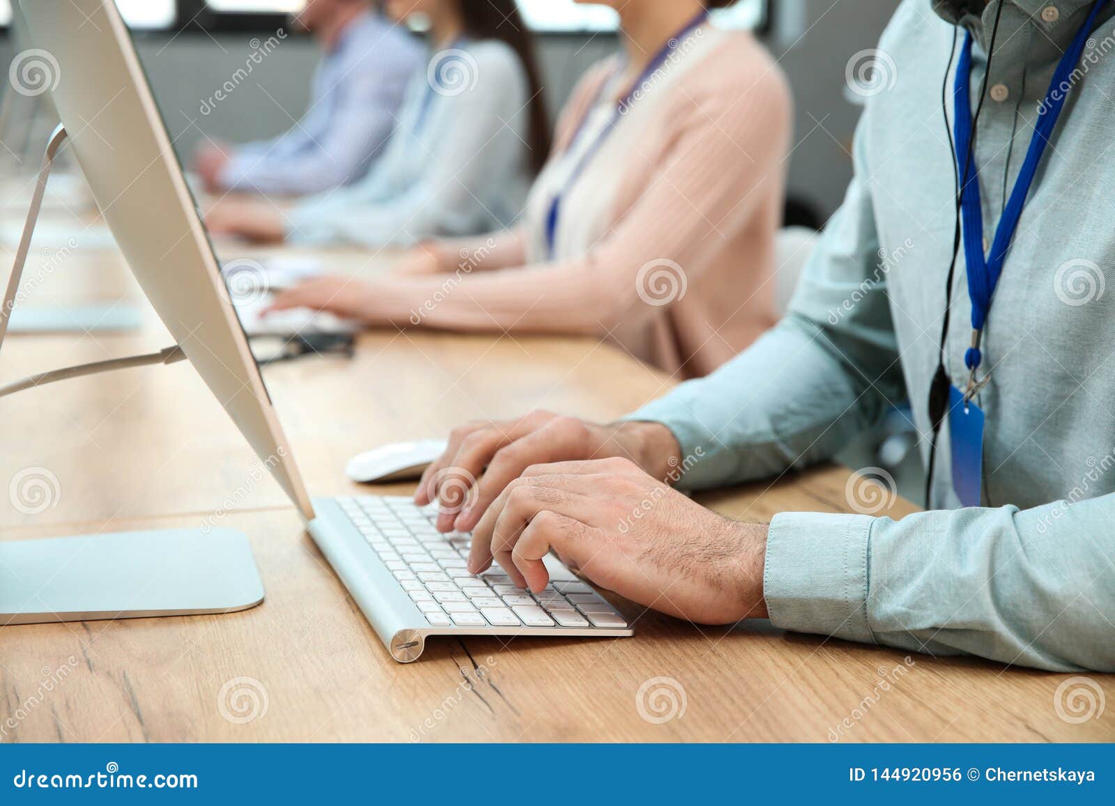 Technical Support Operator Working at Table in Office, Closeup Stock ...