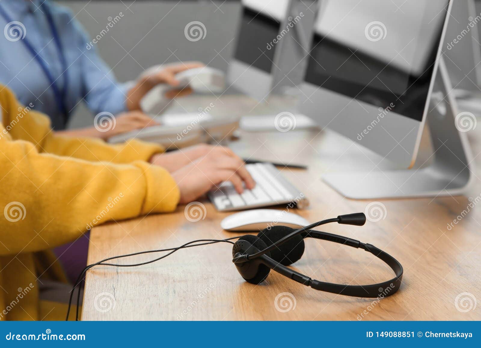 Technical Support Operators Working at Table in Office Stock Image ...