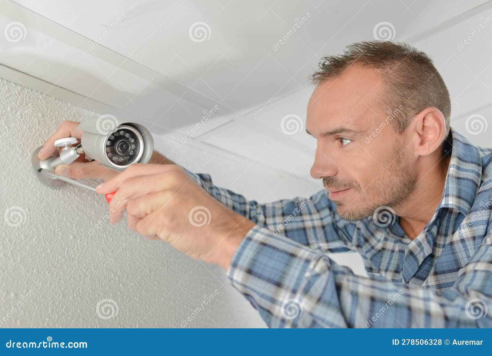 Technician Adjusting Cctv Camera on Wall Stock Photo - Image of male ...