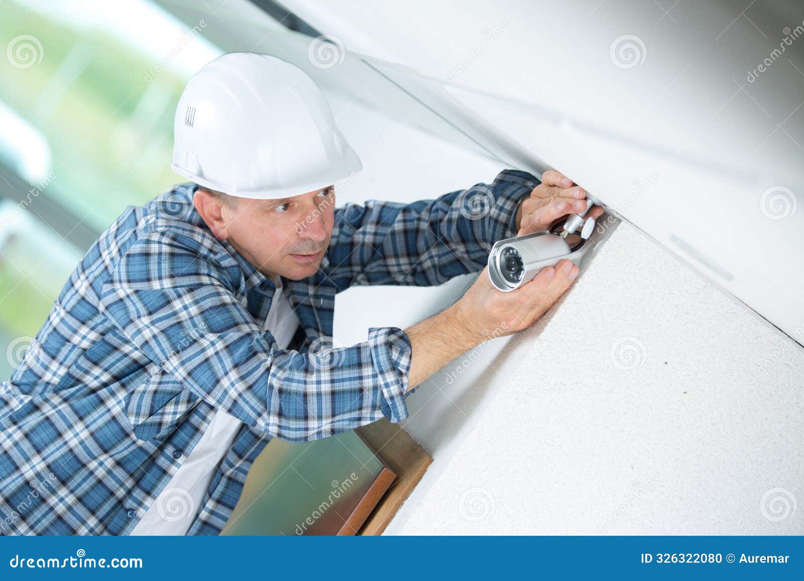 Technician Adjusting Cctv Camera on Wall Stock Photo - Image of system ...