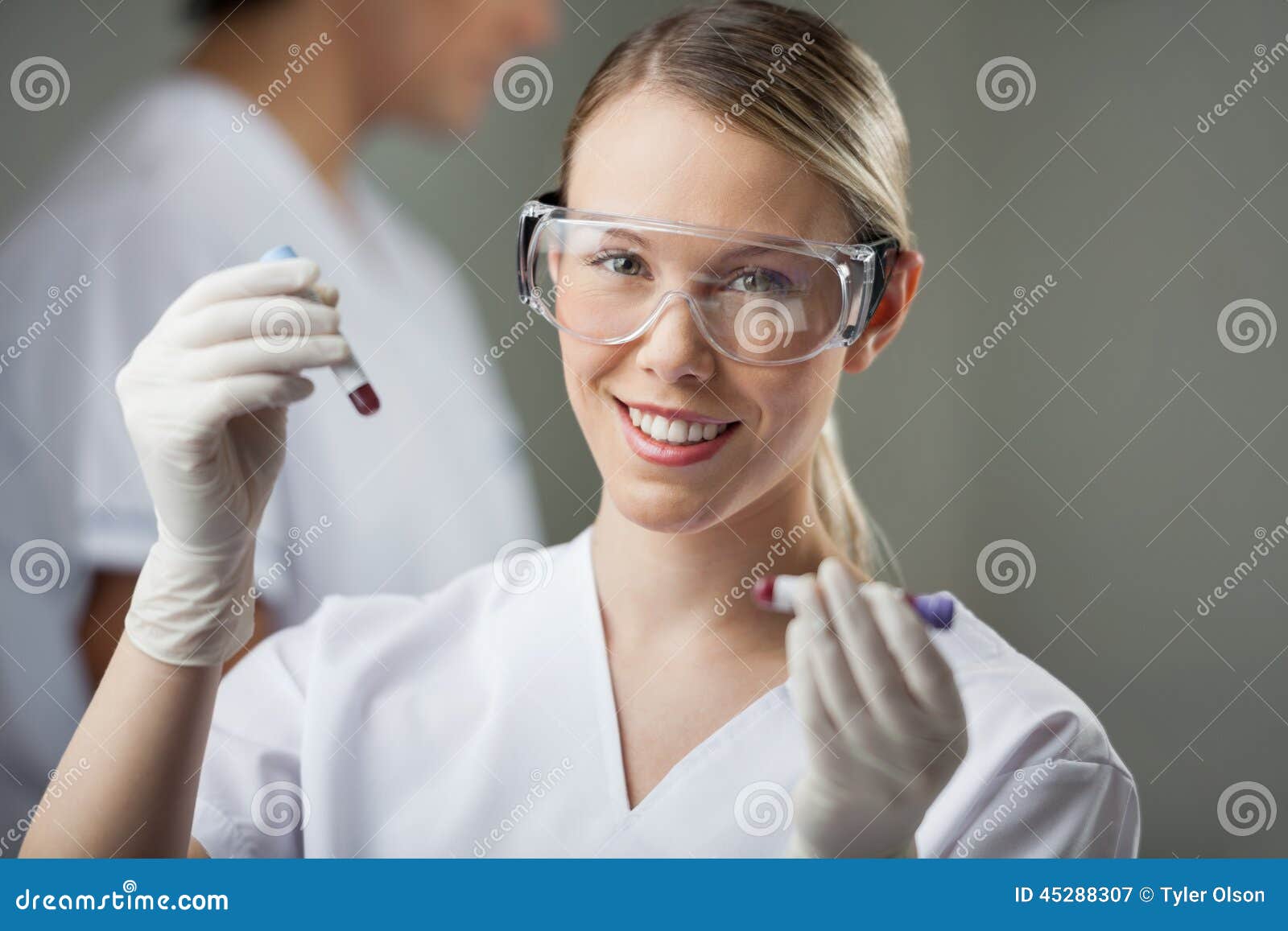 Technician Analyzing Blood Samples in Lab Stock Image - Image of happy ...