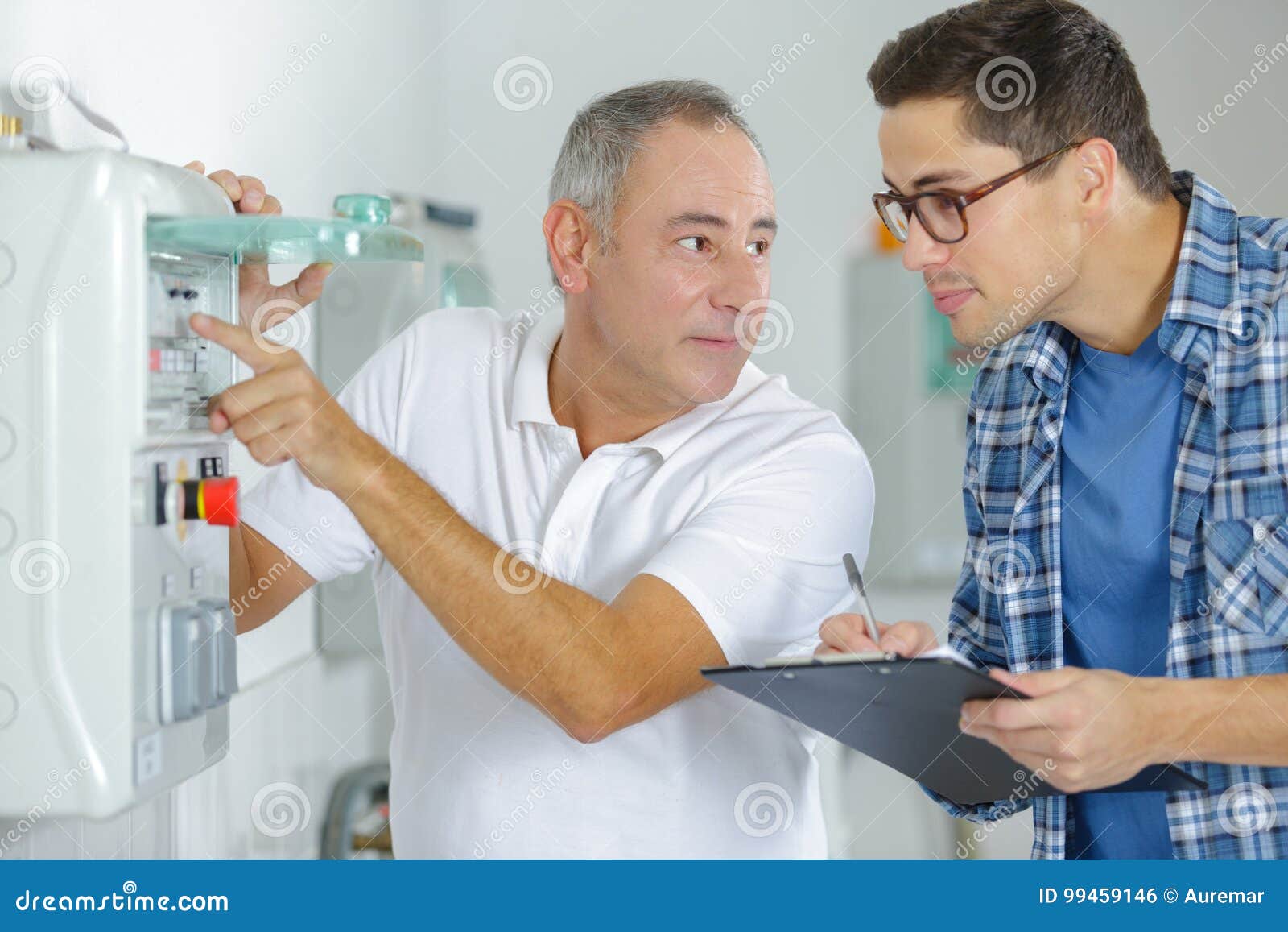 Technician and Apprentice Fixing Photocopier Machine Stock Photo ...