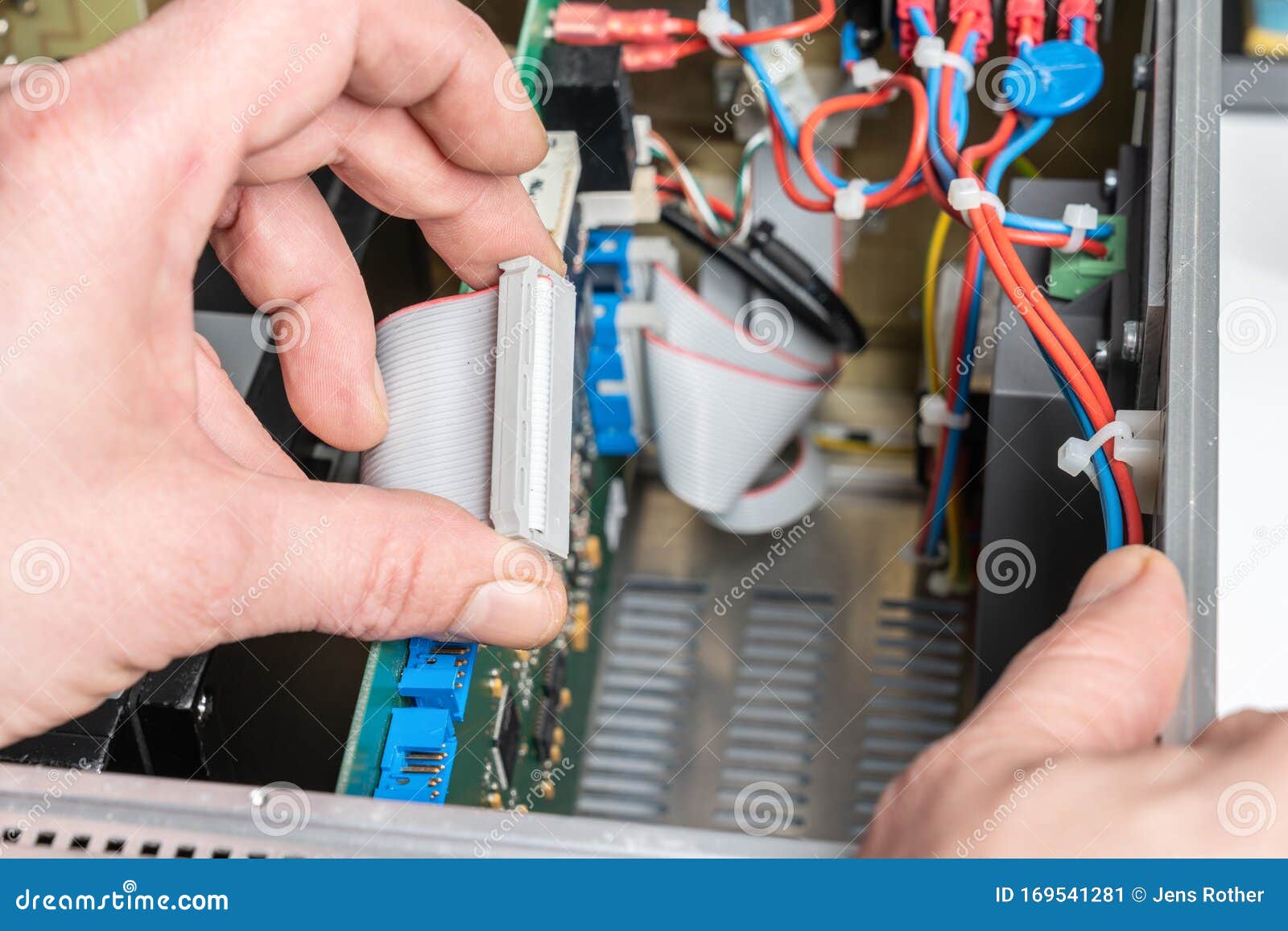Technician Assembles Components of an Electrical Device Stock Image ...
