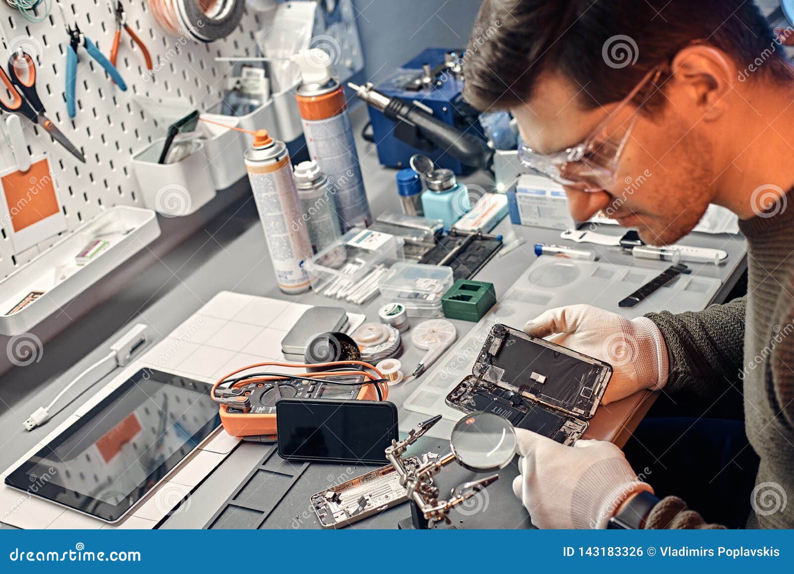 Technician Carefully Examines the Integrity of the Internal Elements of ...