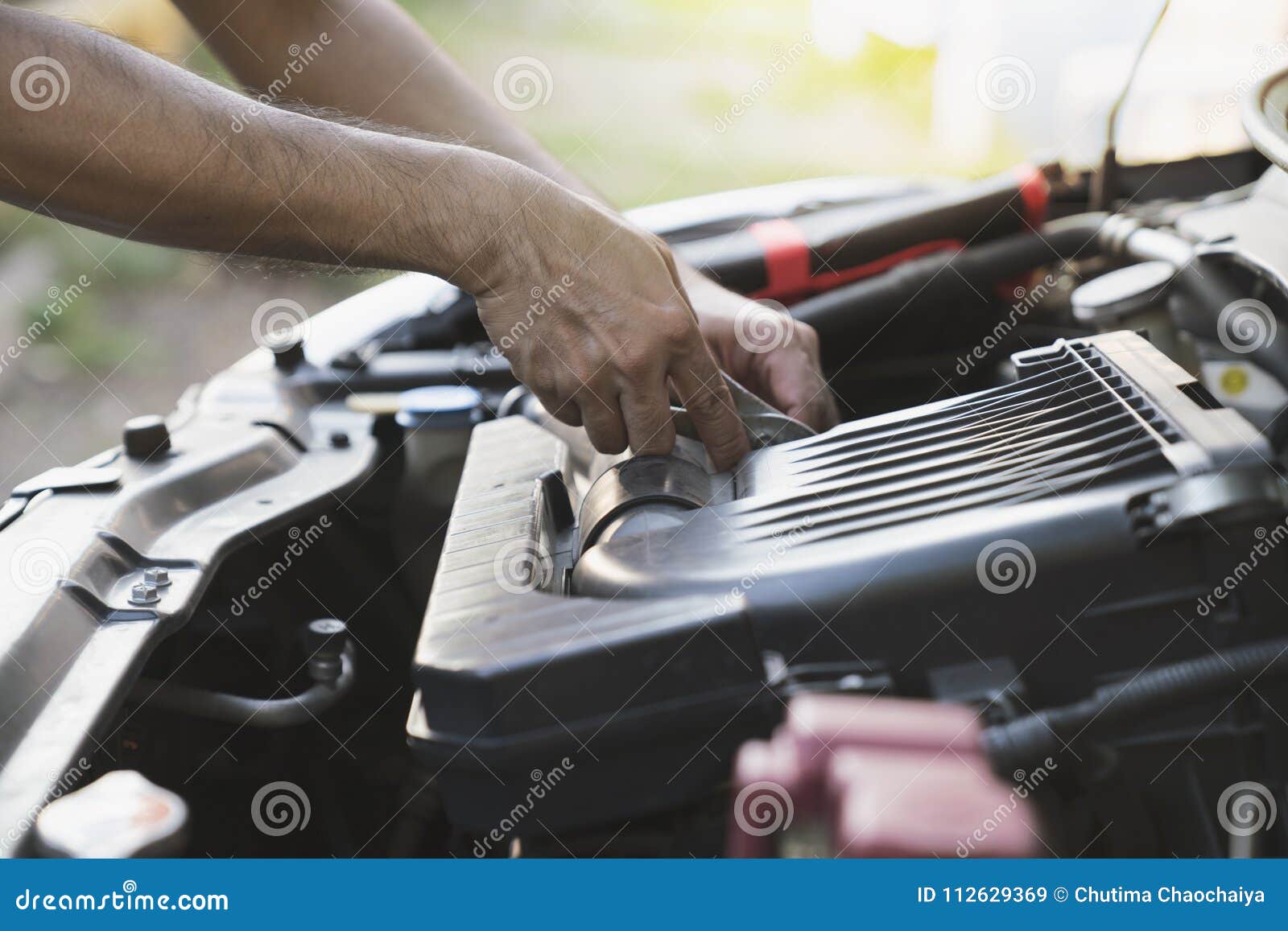 Technician Check Hole On Old The Gasoline Injector Part In Engine Room ...