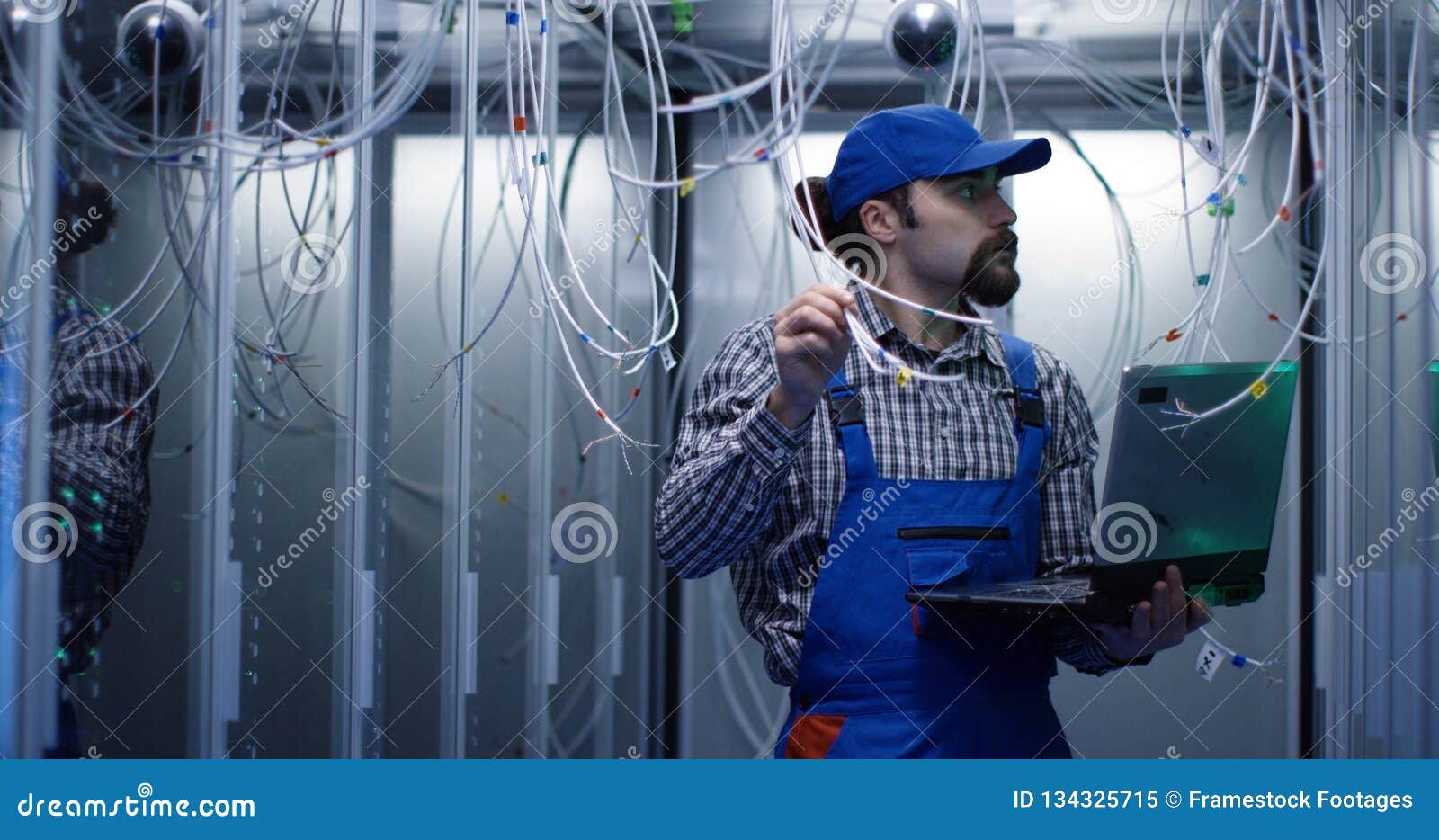 Technician Checking Cables in a Data Center Stock Image - Image of ...