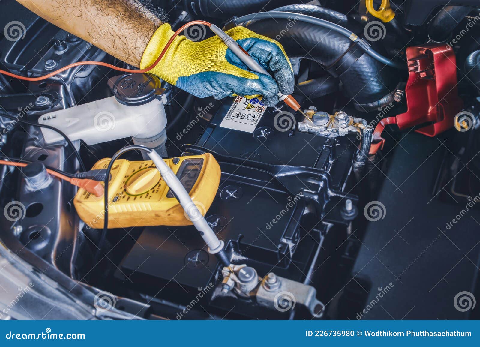 Technician Checking DC Voltage Car Battery with Digital Multimeter ...