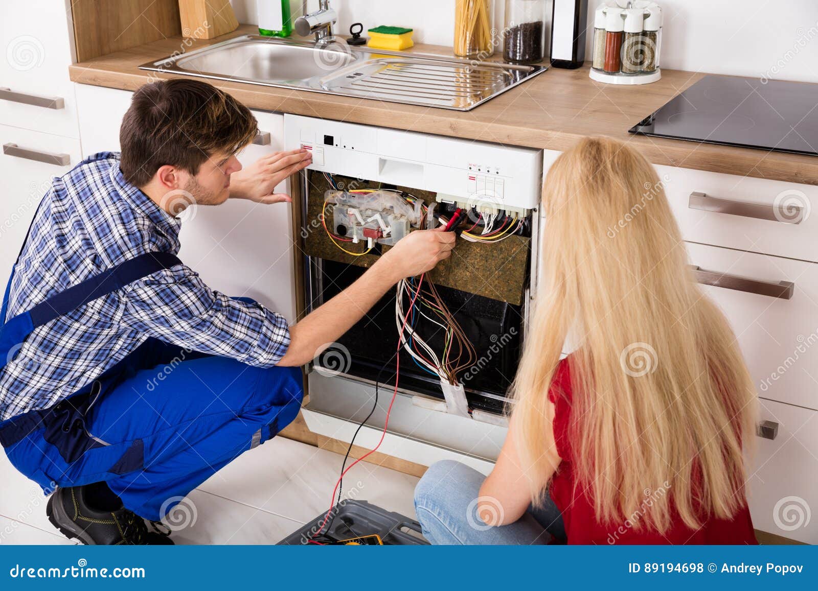 Technician Checking Dishwasher in Kitchen Stock Photo - Image of ...