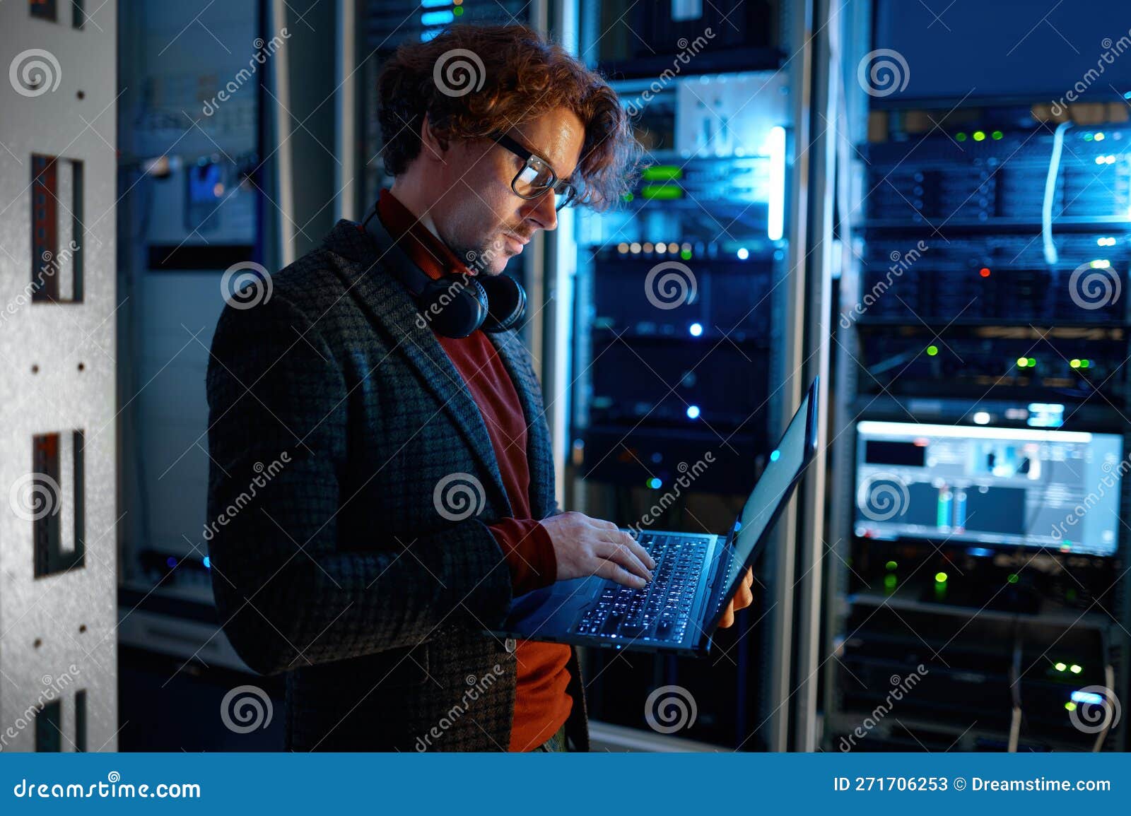 It Technician Checking the Servers Vitals Using Laptop Computer Stock ...