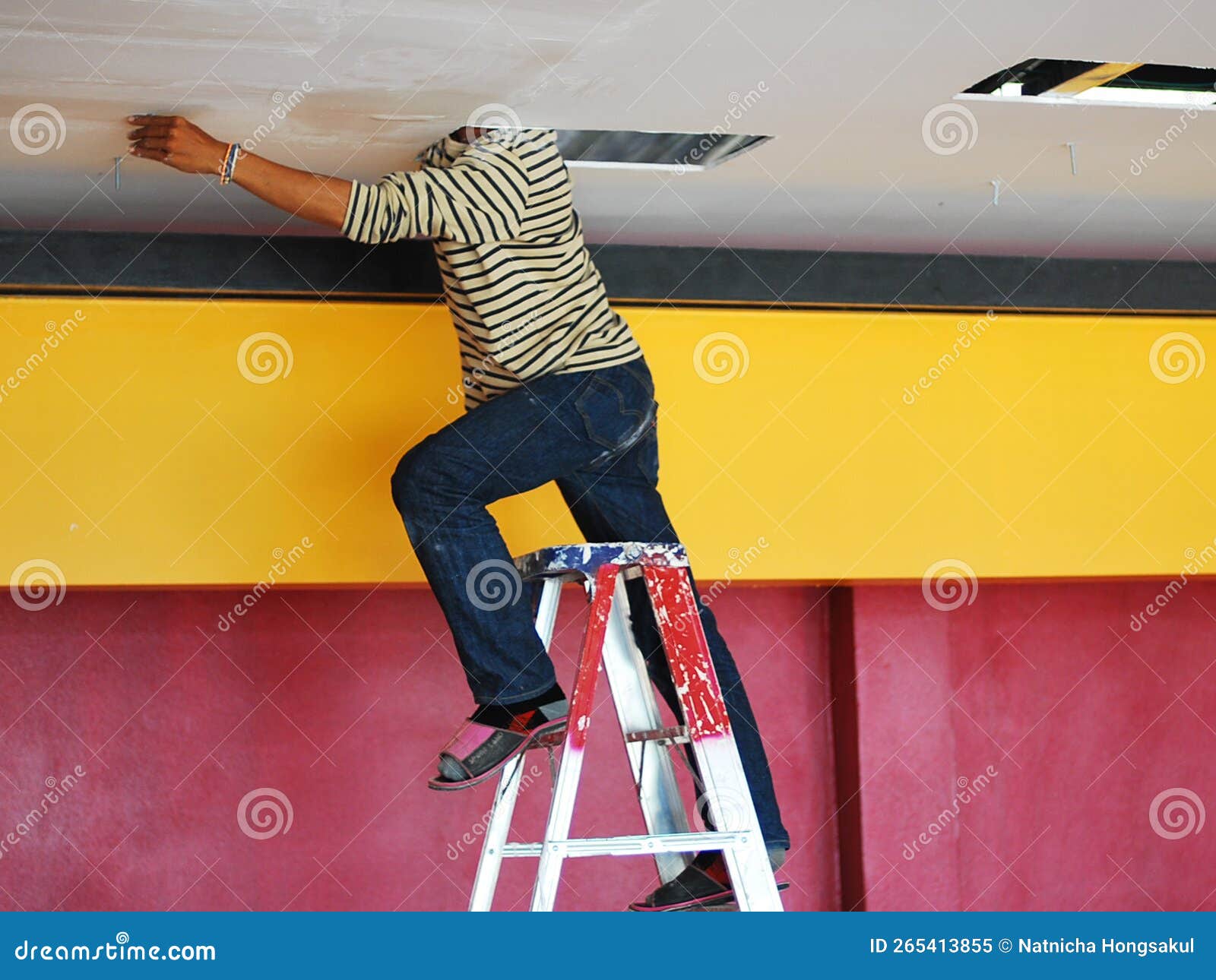 Technician Climbing Ceiling To Install Wiring System. Stock Image ...