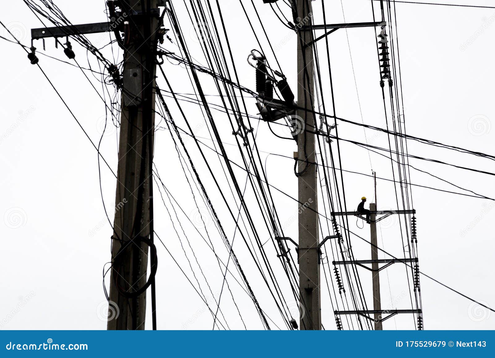 A Technician Climbing on Electricity Post To Fix a Problem with Safety ...