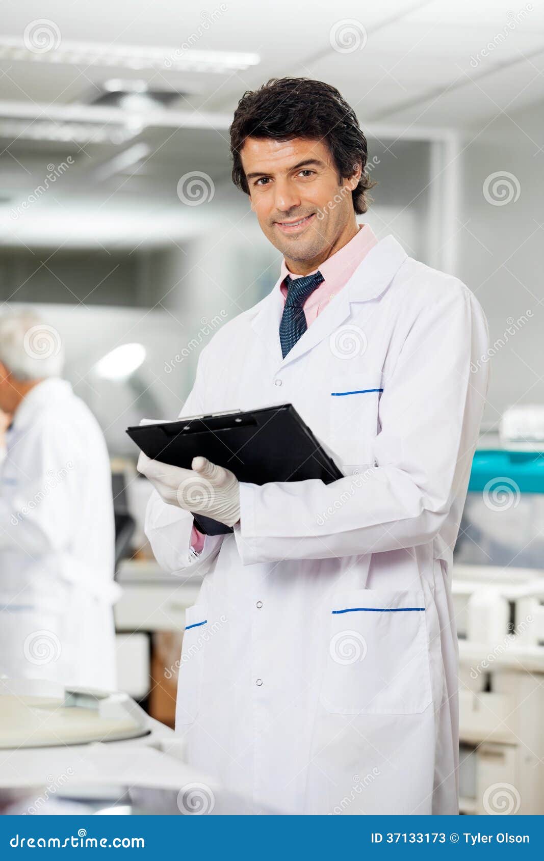 Technician with Clipboard in Laboratory Stock Image - Image of ...