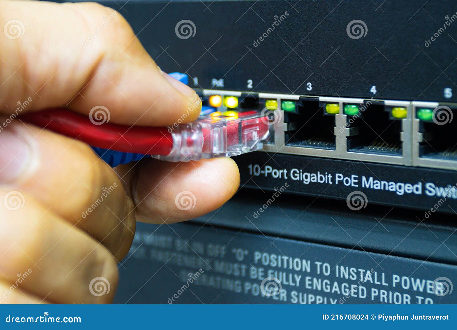Technician Connect Cable Network To Switch Port in Server Room ...