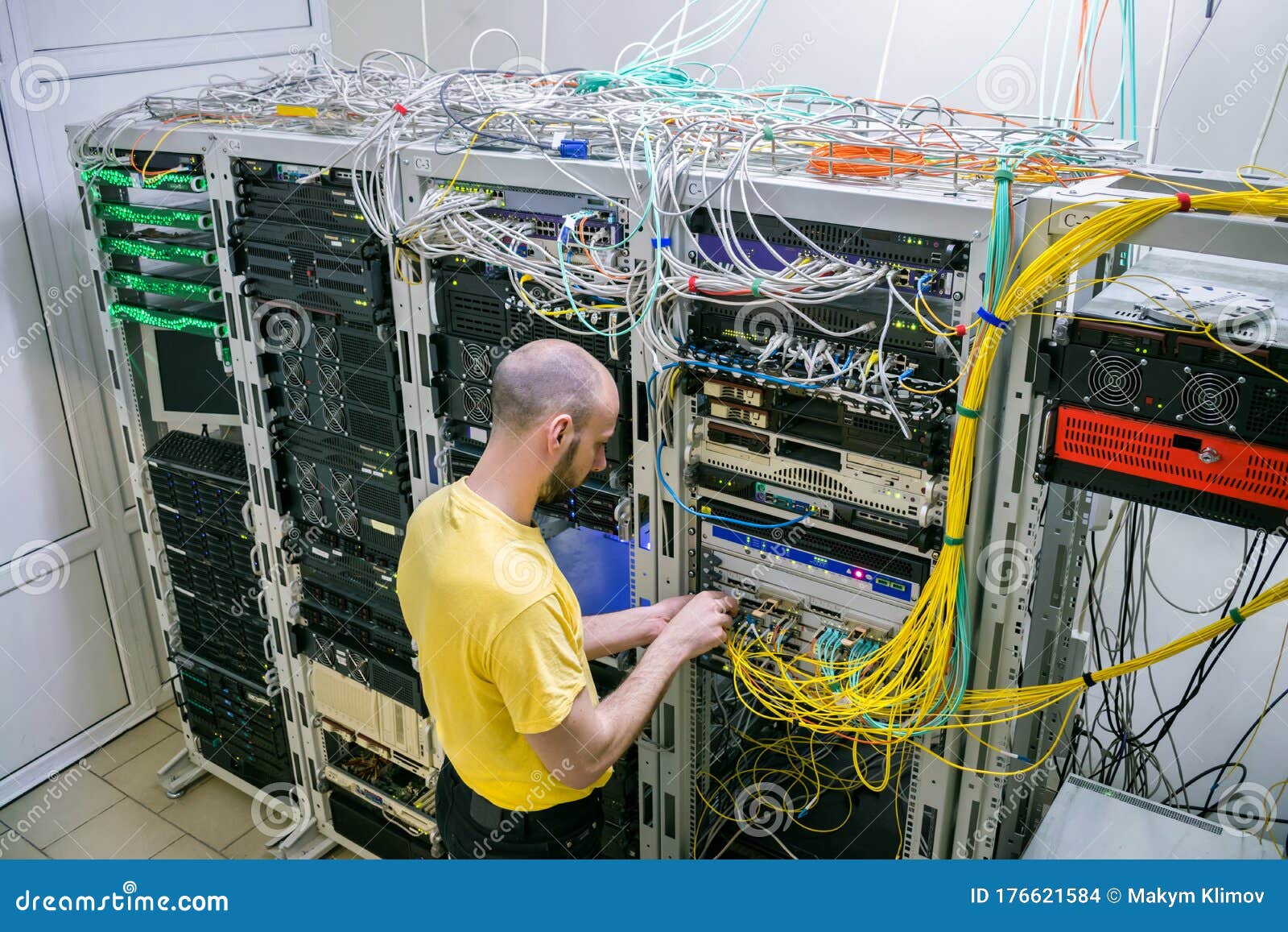 A Technician Connects Internet Backbones with a Central Router. Worker ...