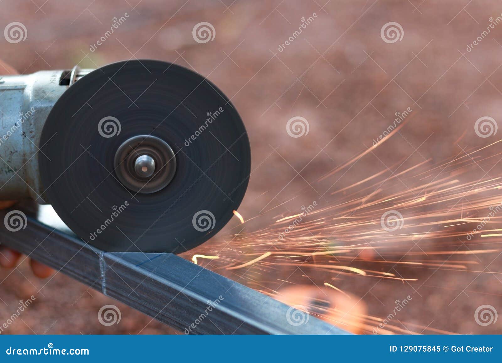 Technician Cutting Steel with Tool in the Workplace. Stock Image ...