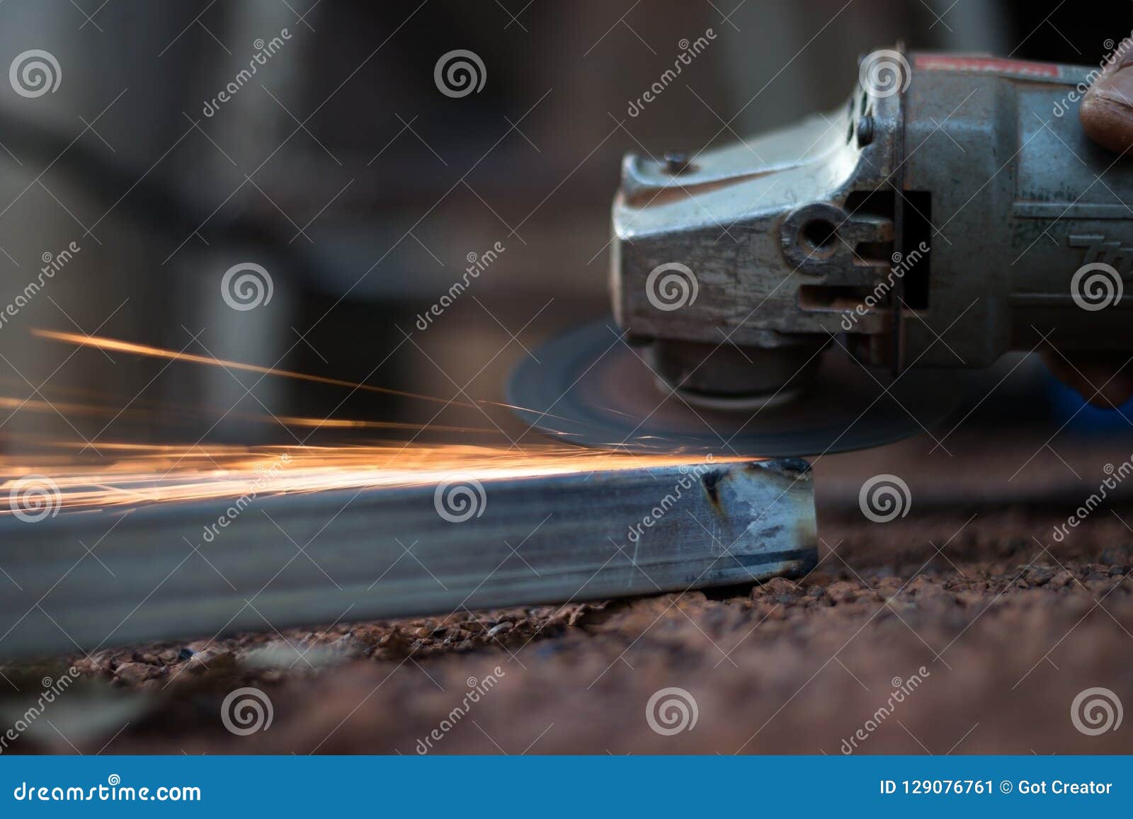Technician Cutting Steel with Tool in the Workplace. Stock Image ...