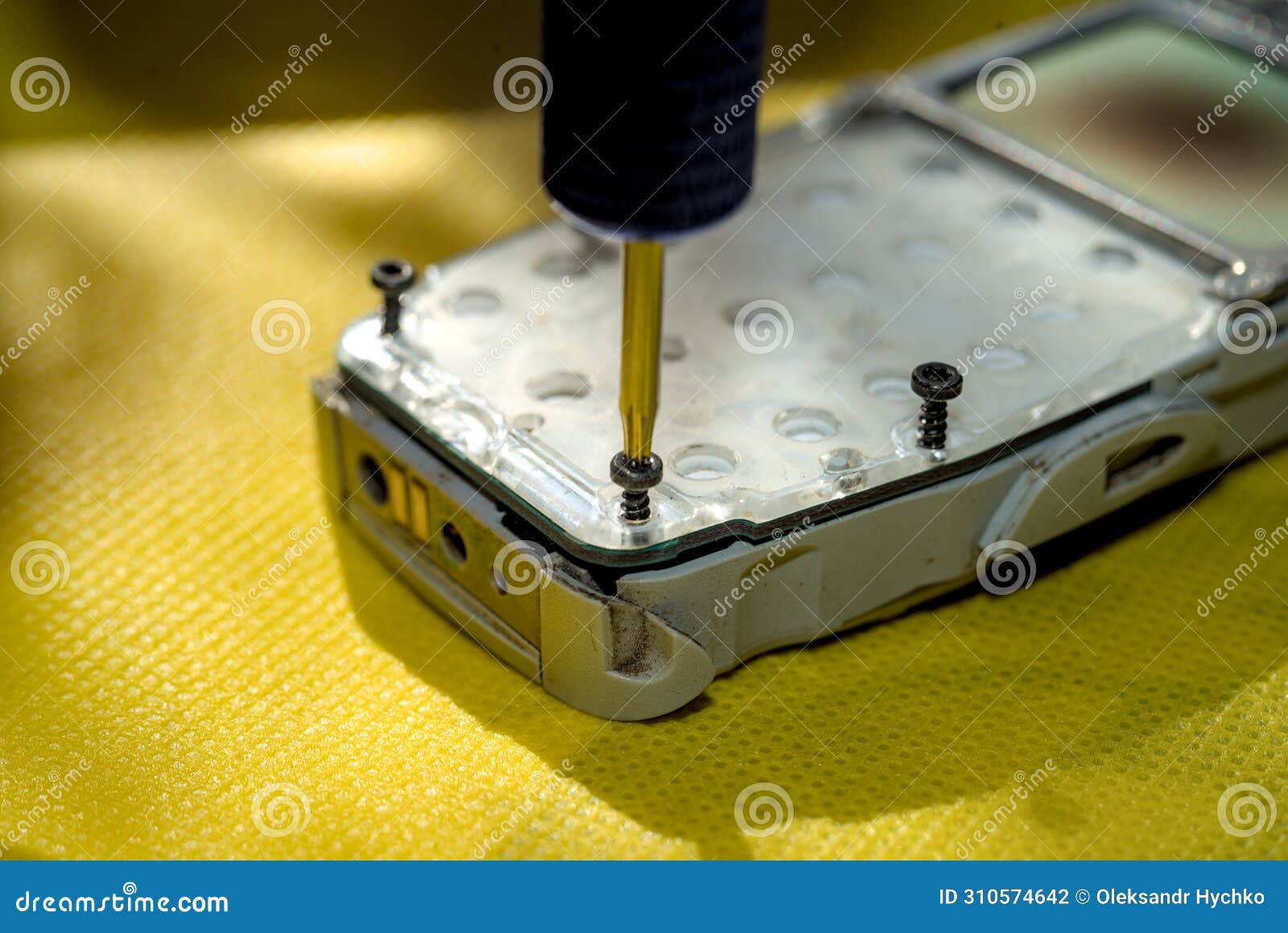 Technician Disassembling Components of Broken Phone for Repair Stock ...